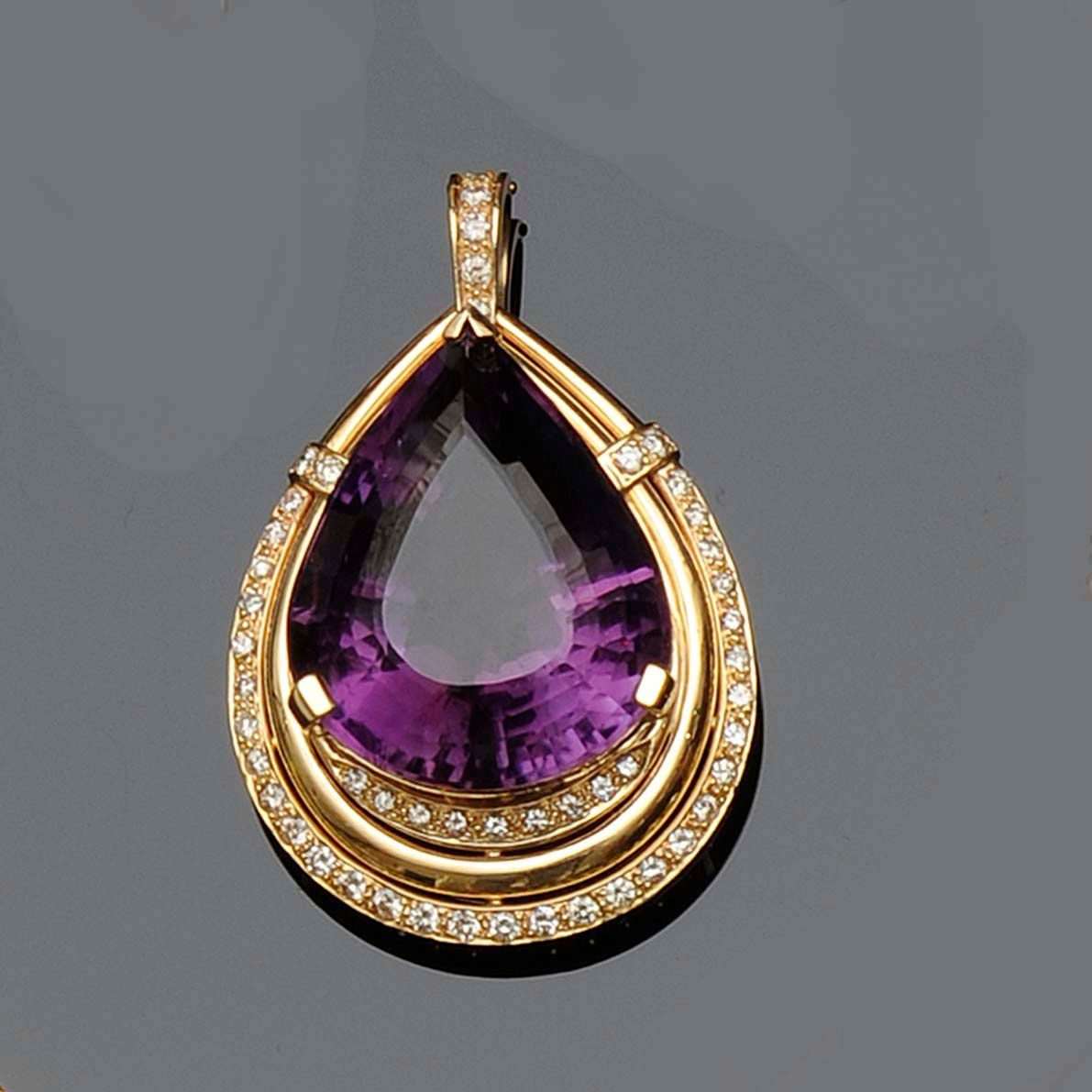 Bonhams : A large pear-shaped amethyst pendant