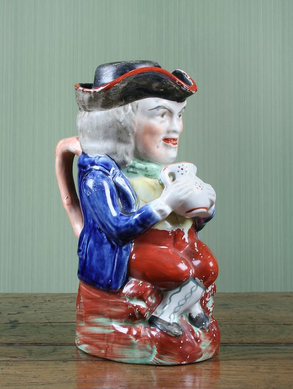 Bonhams : A Staffordshire Toby jug and crown, circa 1850-60