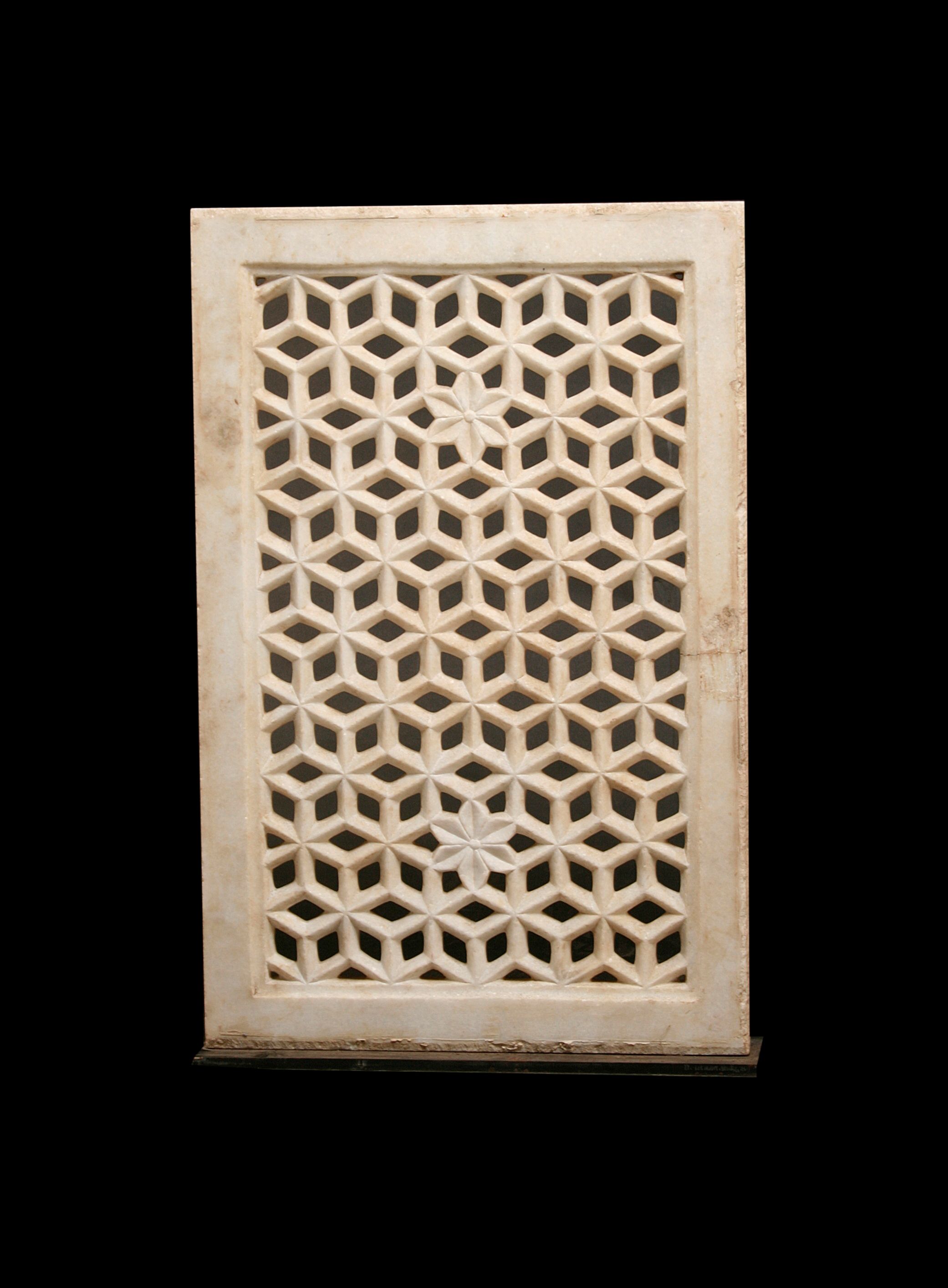 Bonhams : A pair of Mughal style carved white marble jali screens