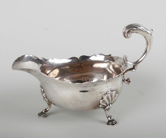 Bonhams : A George II silver sauce boat, by Robert Albin, London 1756,