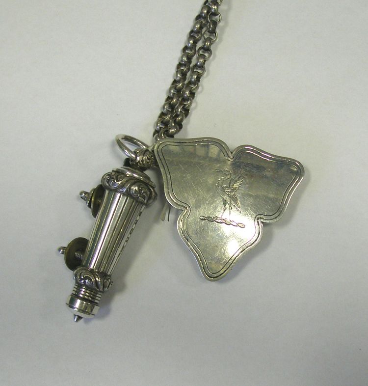 Bonhams : A Victorian silver Rifleman's whistle, chain and badge, by ...