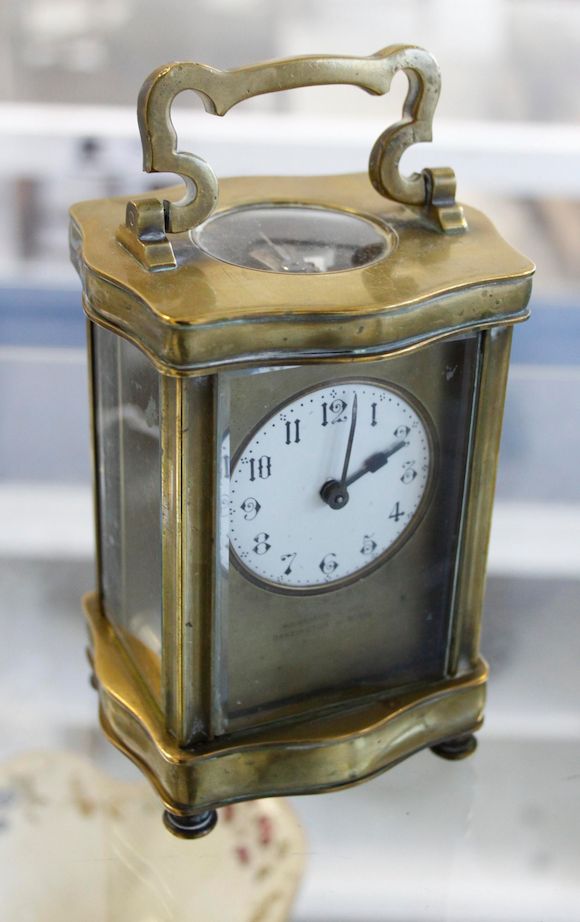 Bonhams : A brass five glass carriage timepiece retailed by Harrison & Son.