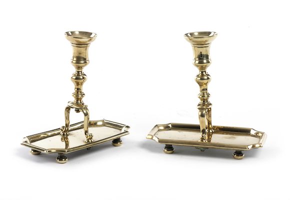 Bonhams : A pair of late 18th century French brass candlesticks