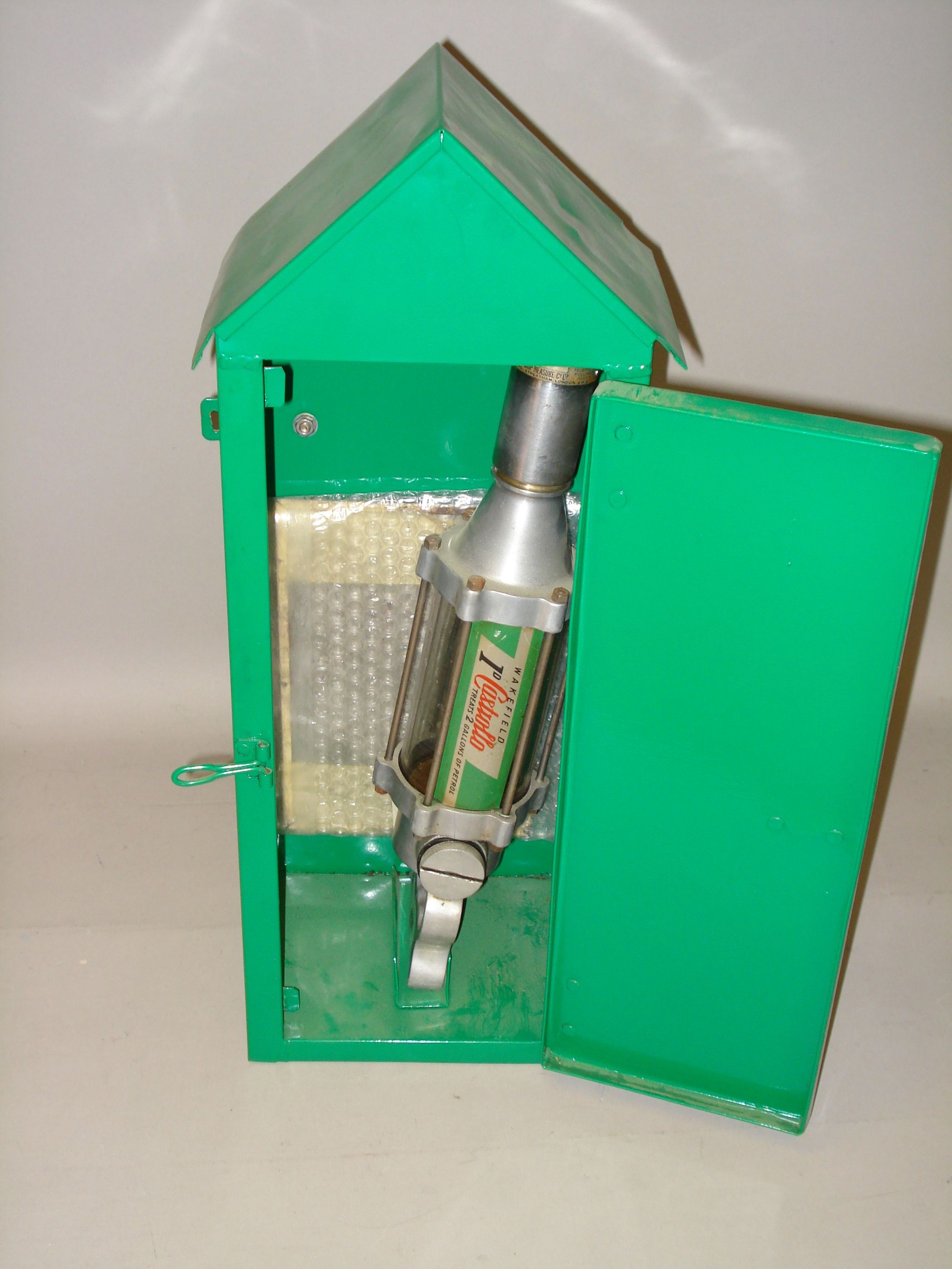 Bonhams Cars : A Castrol oil dispenser cabinet,