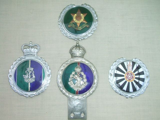 Bonhams Cars : A group of 4 enamelled badges by J.R. Gaunt,
