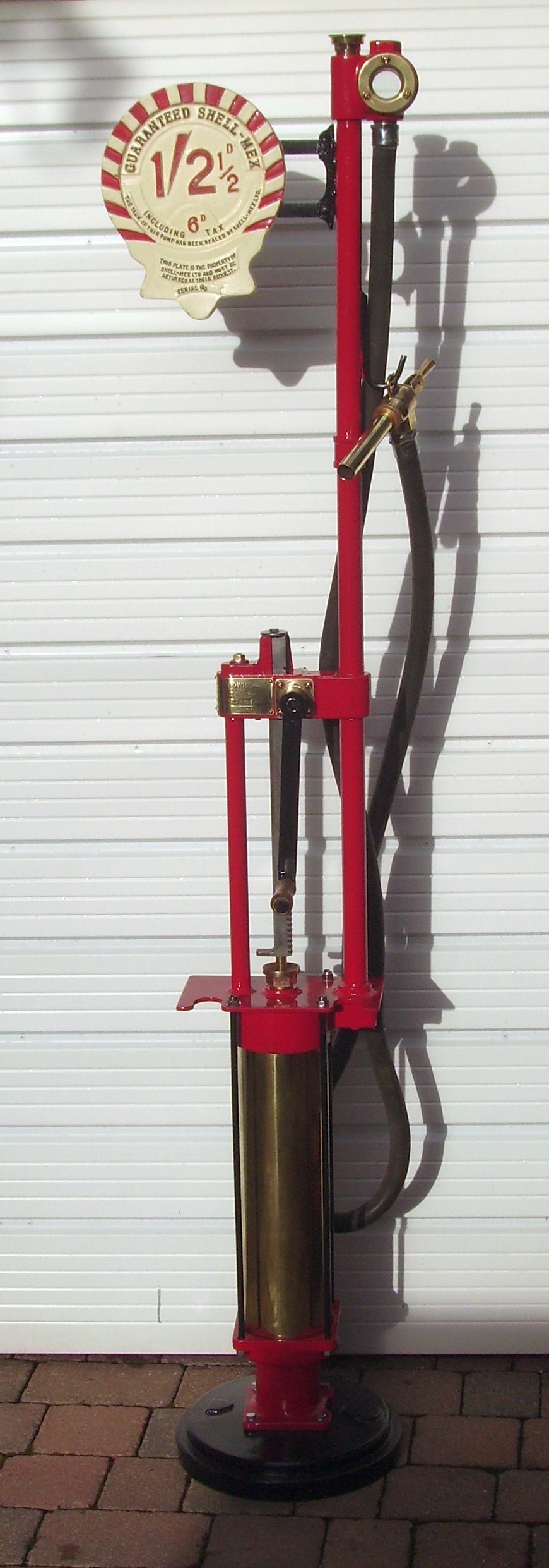 Bonhams Cars : A Godwin hand-cranked skeleton petrol pump,