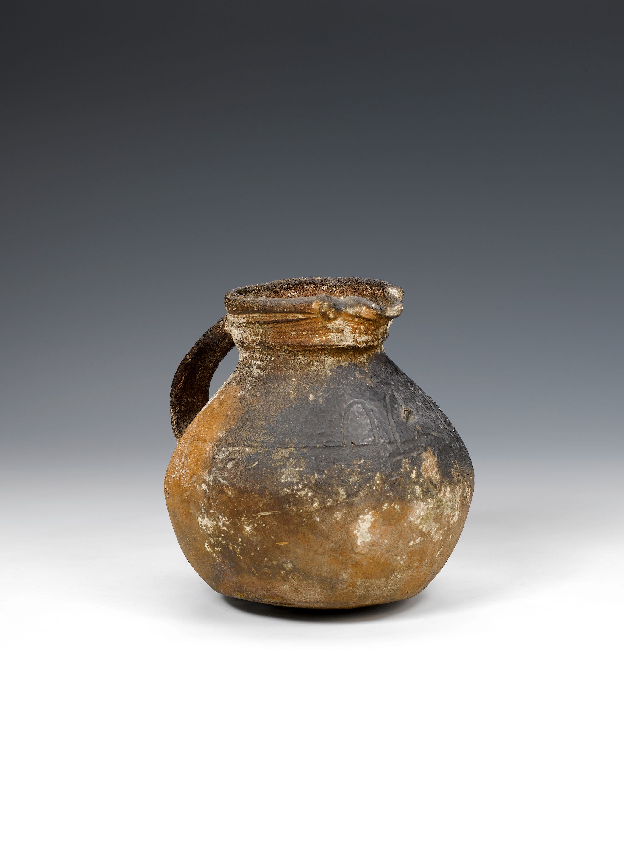 Bonhams : An English Medieval jug 13th century