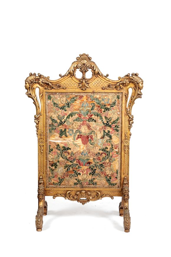 Bonhams : An antique carved giltwood cheval fire screen