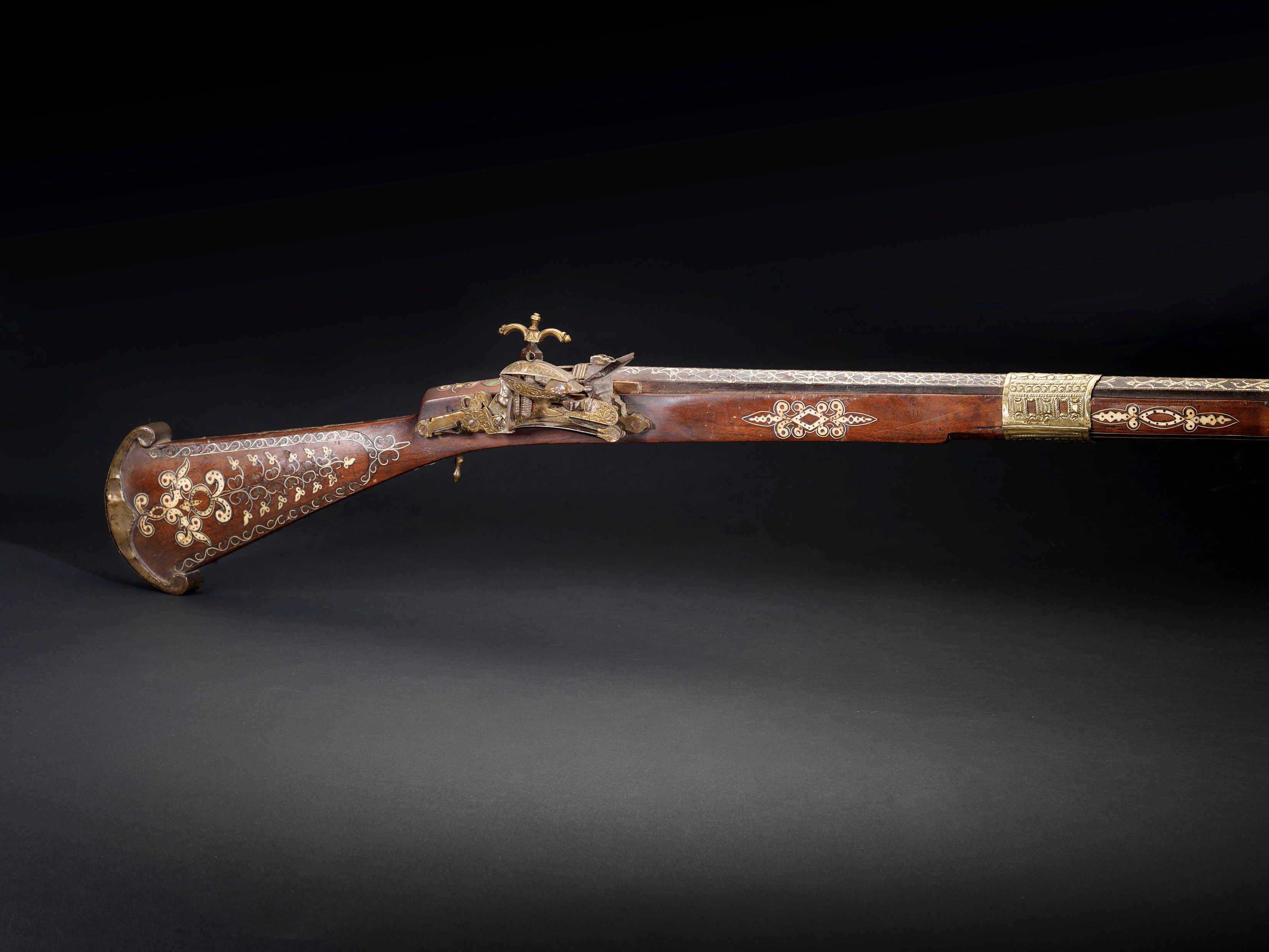 An Ottoman ivory inlaid flintlock Rifle, signed Ahmed North Africa ...