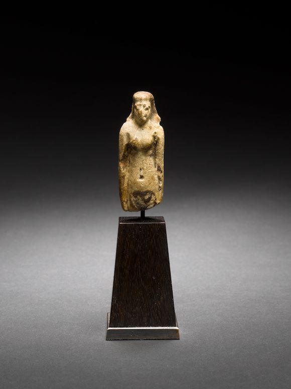 Bonhams : A Greek white glazed composition female figure