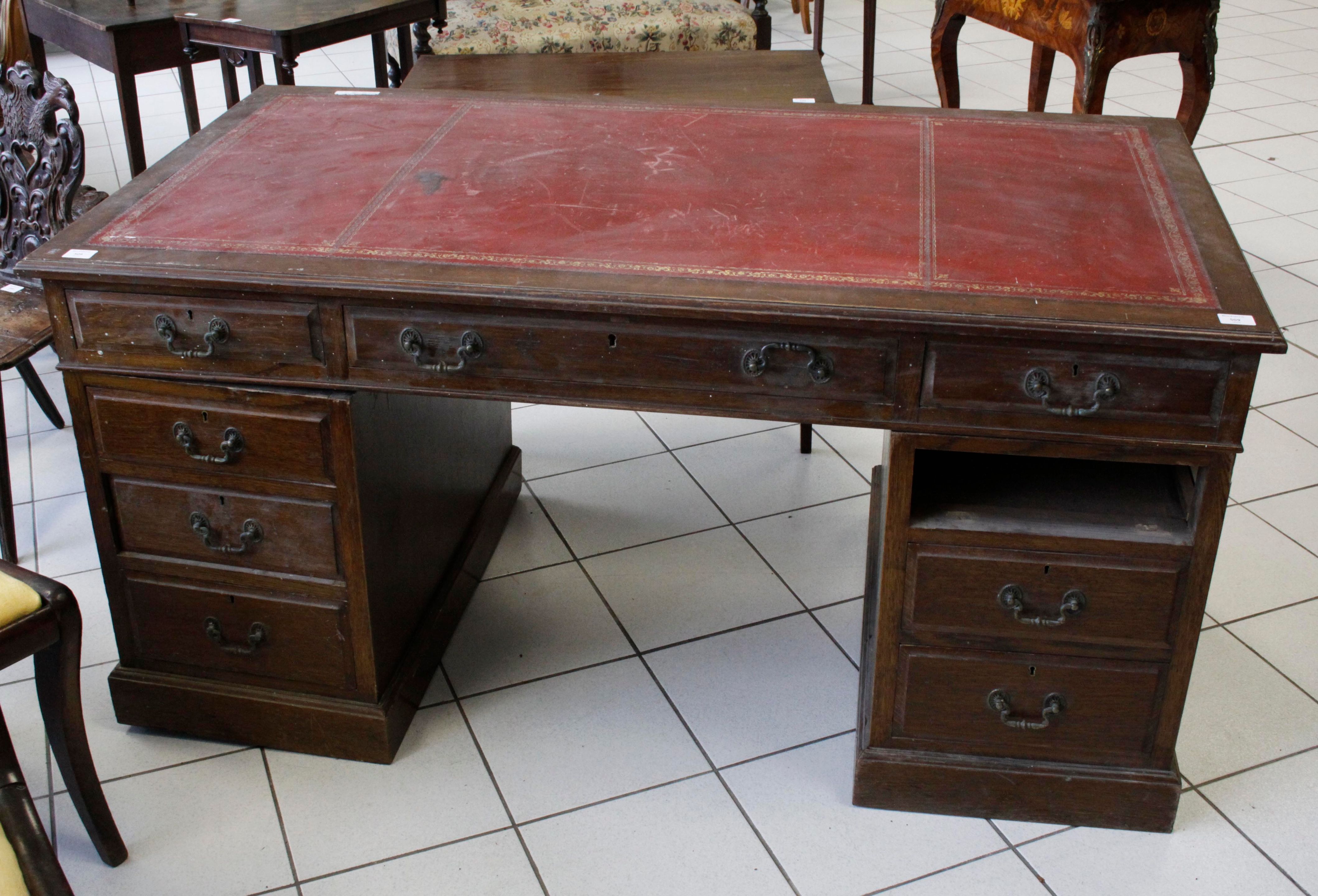Bonhams : An oak twin pedestal desk,with inset leather above nine ...
