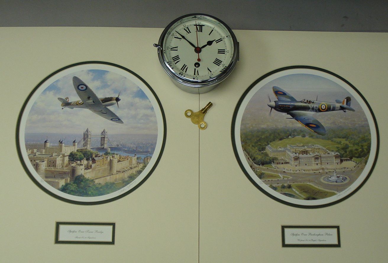 A pair of limited edition prints depicting Spitfires over London, after ...