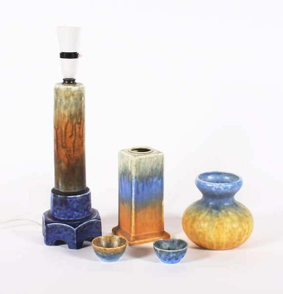 Bonhams : A Ruskin Pottery lamp base, two vases and two small bowls