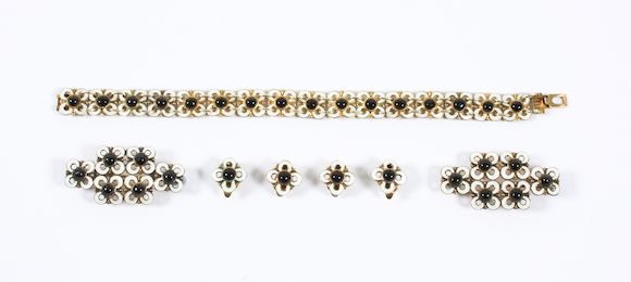 Bonhams : An unusual David-Andersen suite of ivory and black enamel ...