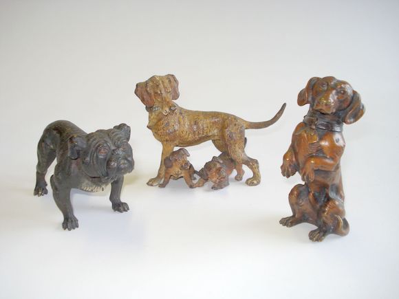 Bonhams : Three Austrian cold-painted bronze dogs