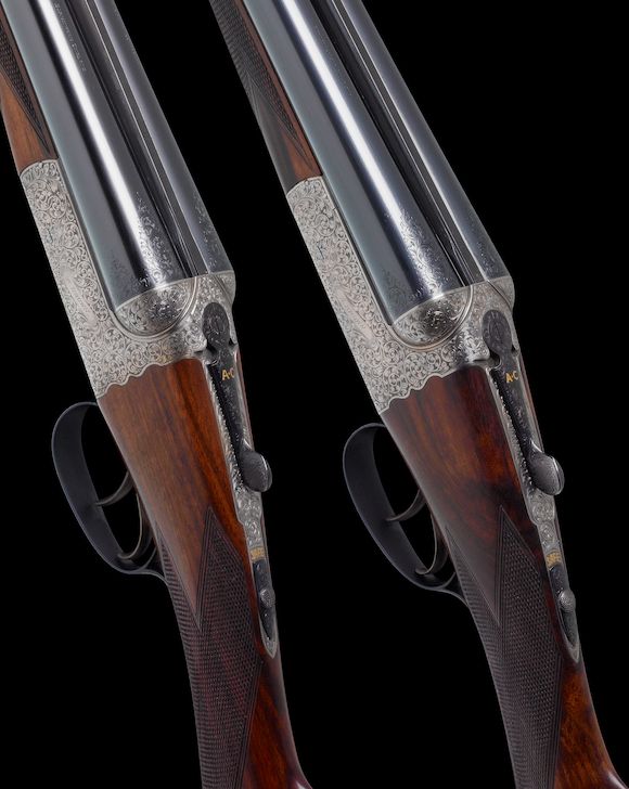Bonhams : A pair of Howe-engraved 12-bore (2¾in) easy-opening boxlock ...