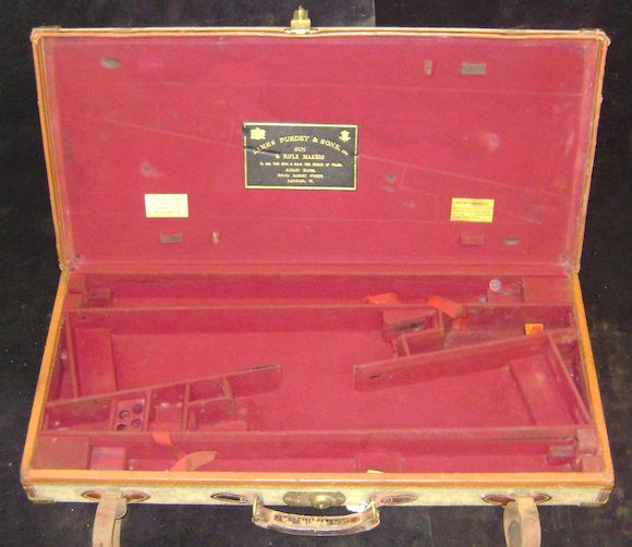 Bonhams : A James Purdey & Sons brass-mounted canvas double rifle-case