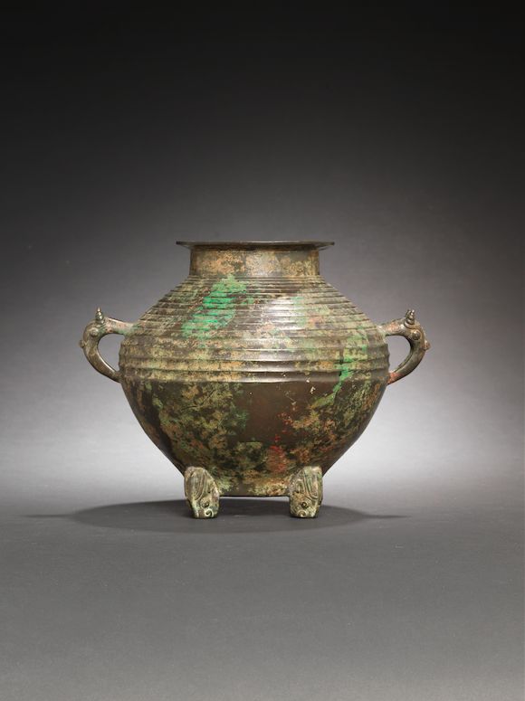 Bonhams : A bronze tripod vessel, lei Spring and Autumn Period