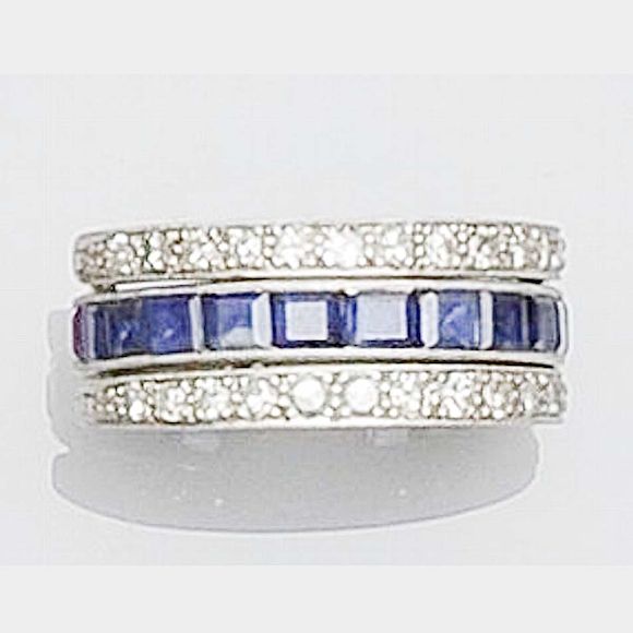 Bonhams : A diamond, ruby and sapphire swivel eternity ring