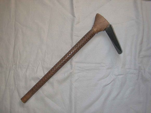 Bonhams : A ceremonial hafted adze Cook Islands 67cm long