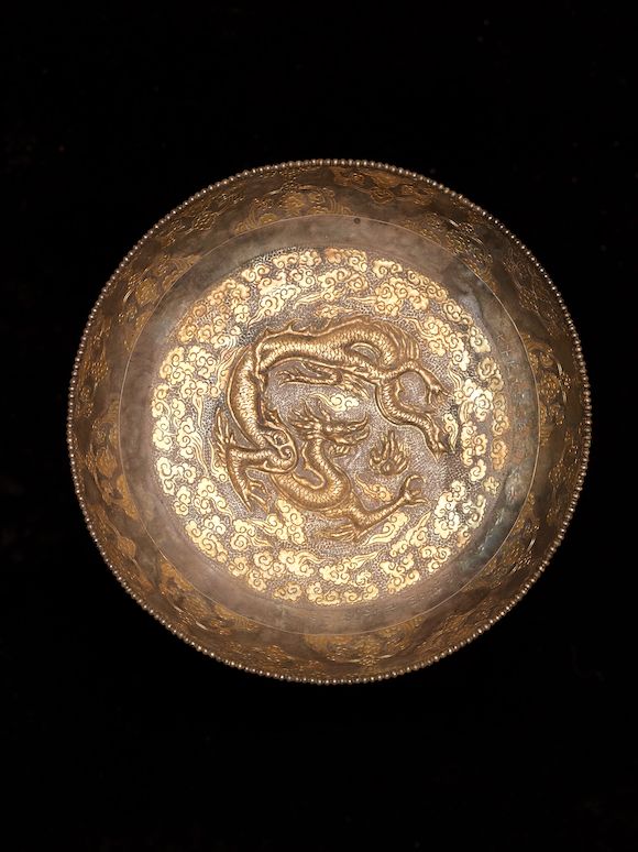 Bonhams : A parcel-gilt 'silver dragon' bowl Liao Dynasty, dated by ...