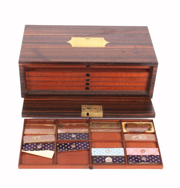 Bonhams : A good quality coromandel wood microscope slide case
