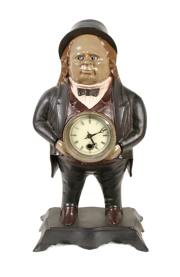 Bonhams : An American timepiece modelled as a standing man holding the ...