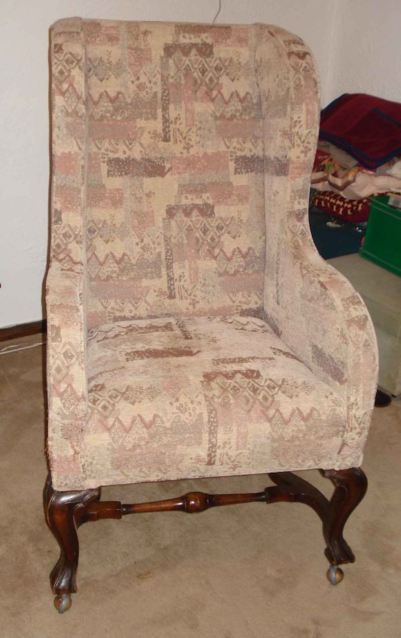 Bonhams : A Carolean style mahogany framed wing armchair