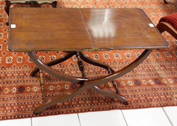 Bonhams : A Victorian mahogany folding coaching table.