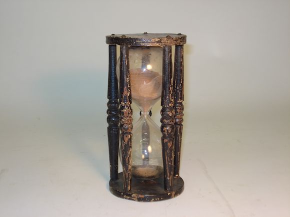 Bonhams : A painted wood sand-glass, European, 19th century.