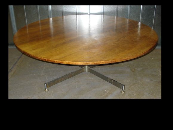 Bonhams : A contemporary laminated rosewood circular low table,