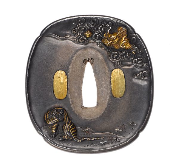 Bonhams : A Mito shibuichi tsuba 19th century