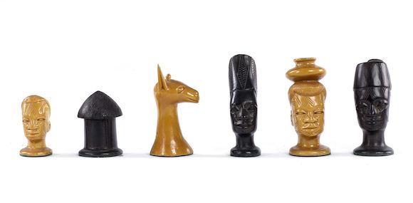 Bonhams : A Makondi tribal ebony chess set Nigerian, circa 1950