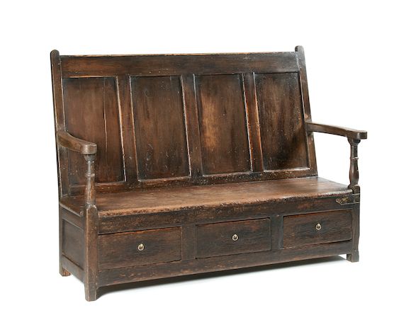 Bonhams : A 19th Century stained pine box settle