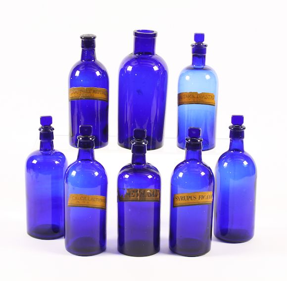 Bonhams : A group of seven similar deep blue glass apothecary bottles ...