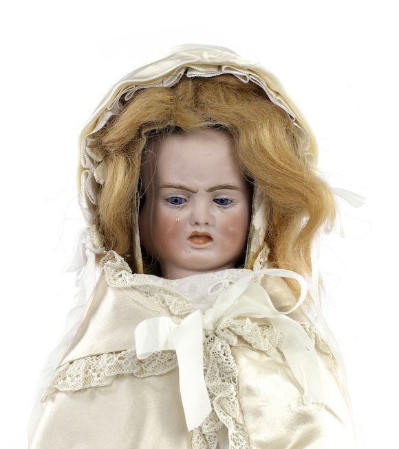 Bonhams : Bisque head three faced doll, circa 1910