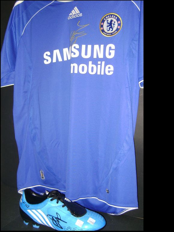 Bonhams : A replica Chelsea shirt and football boot hand signed by Drogba