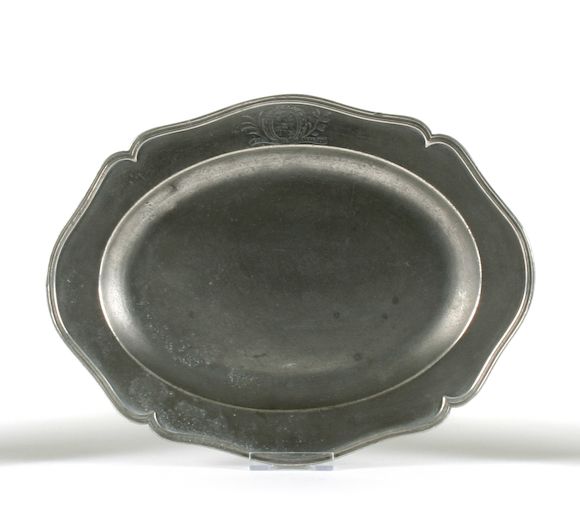 Bonhams : An 18th Century oval reeded wavy edge plate, circa 1770