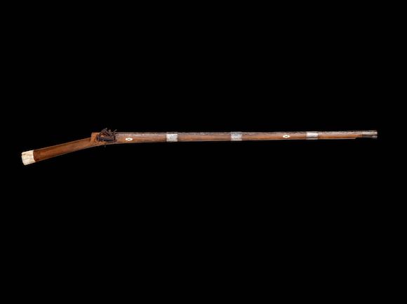 Bonhams : A silver-mounted Caucasian flint lock rifle19th century