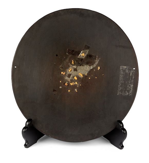 Bonhams : A wooden gold panning dish with gold nuggets