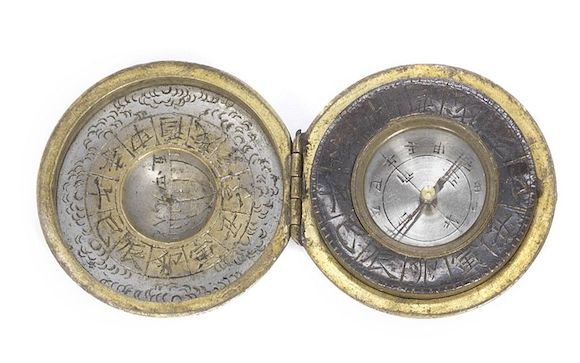 Bonhams : An early 19th century engraved brass netsuke sundial