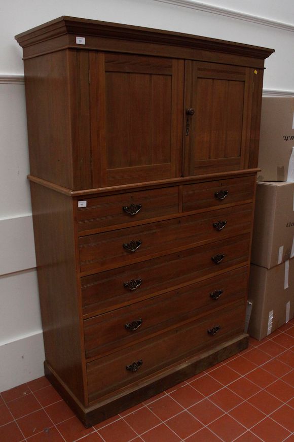 Bonhams : A late Victorian walnut press cupboard,with two short and ...