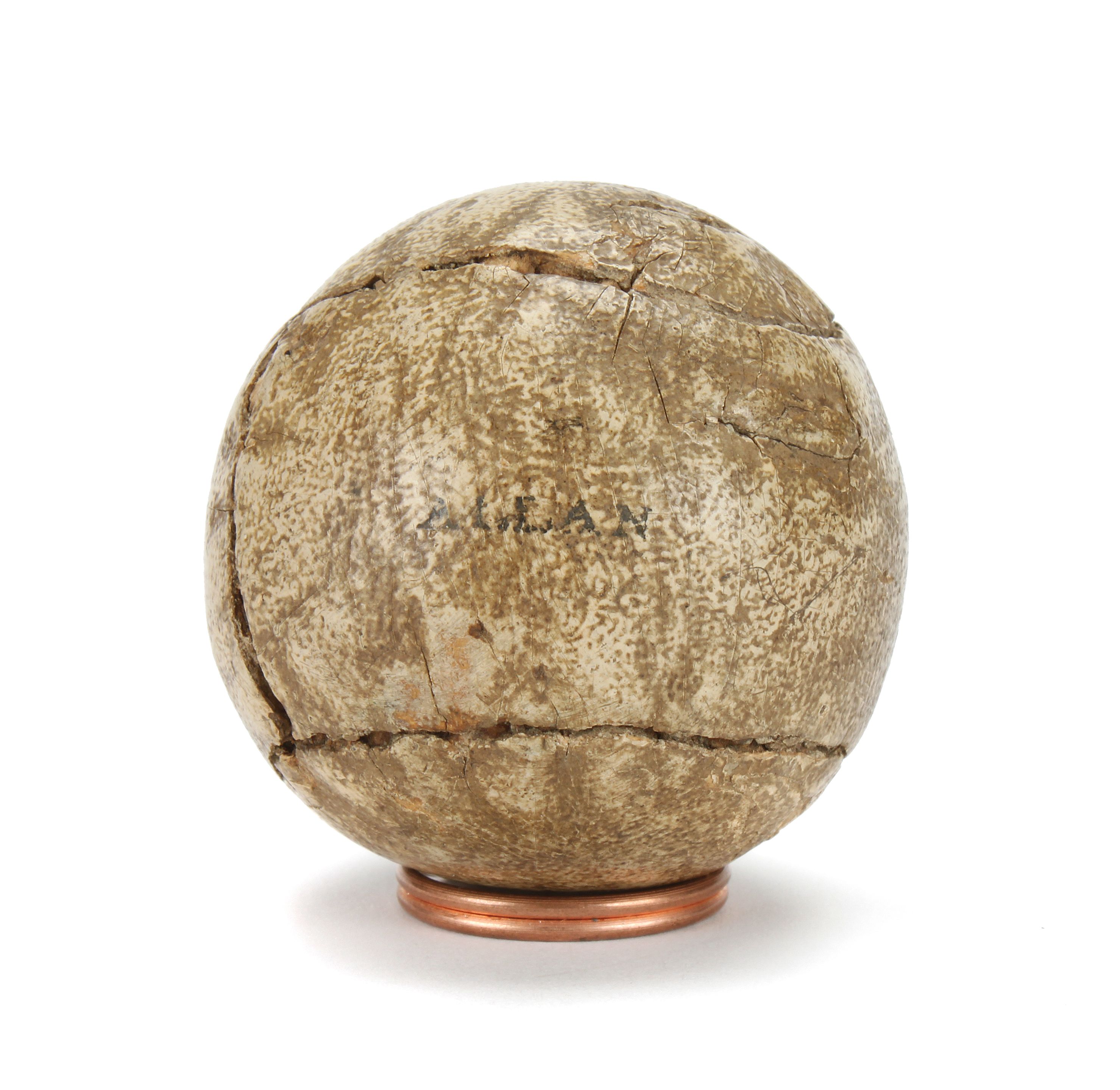 Bonhams : An Allan Roberston stamped feather golf ball circa 1840s