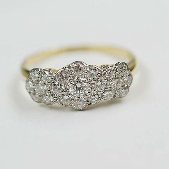 Bonhams : A triple cluster diamond ring