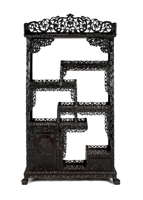 Bonhams : A Chinese carved and pierced hardwood cabinet Bearing ivorine ...
