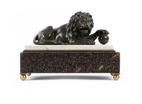 Bonhams : A 19th century patinated bronze model of a lion on an ormolu ...