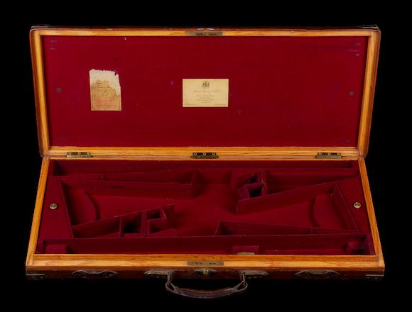 Bonhams : A James Purdey & Sons brass-mounted oak and leather double ...