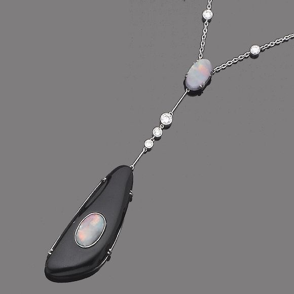 Bonhams : An onyx, opal and diamond pendant necklace