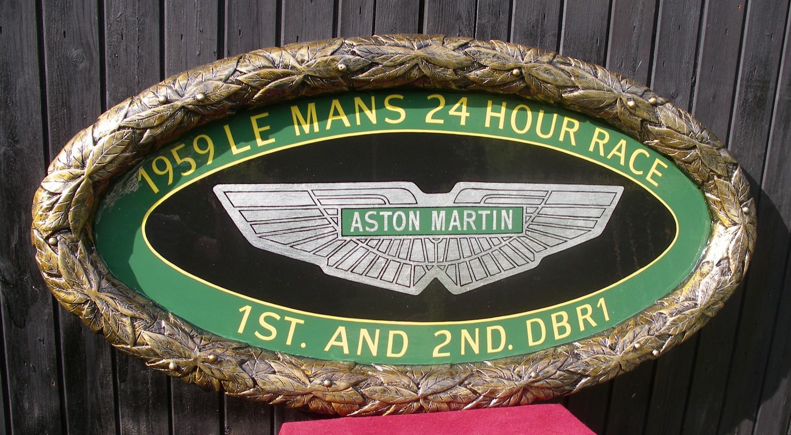 Bonhams Cars : An Aston Martin hand-painted commemorative plaque,
