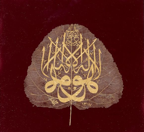 Bonhams : A calligraphic composition in gold on a natural leaf, signed ...